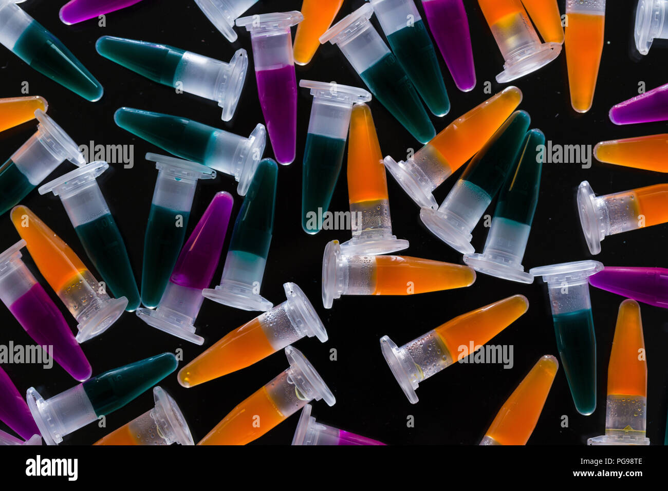 PCR tubes on black background Stock Photo - Alamy