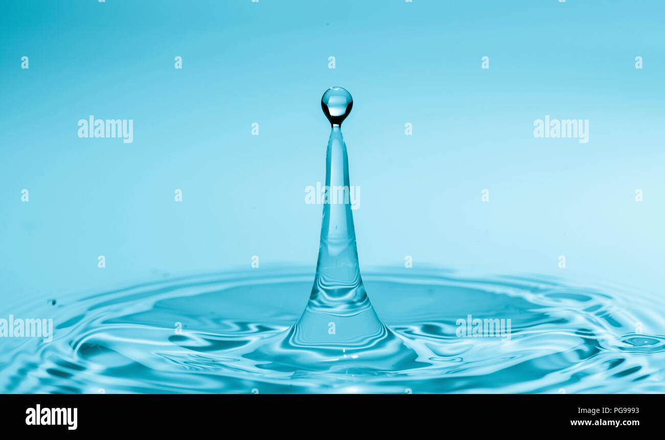 Water drop impact Stock Photo - Alamy