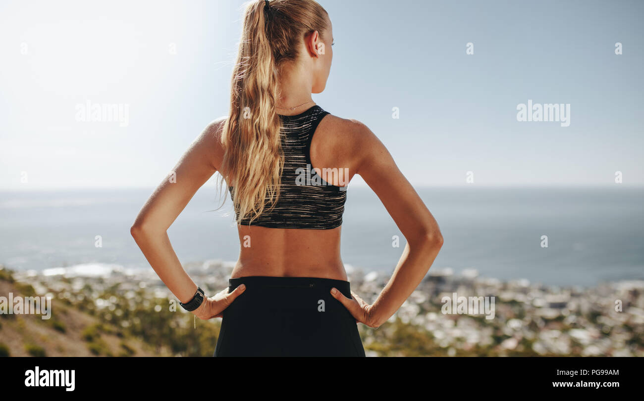 Woman running rear view hi-res stock photography and images - Alamy