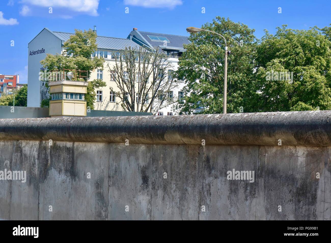 Berlin, Germany. Summer. August 2018. Berlin wall remnant and guard ...