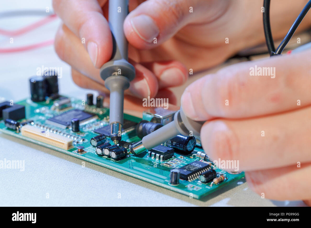 Repairing printed circuit board Stock Photo - Alamy