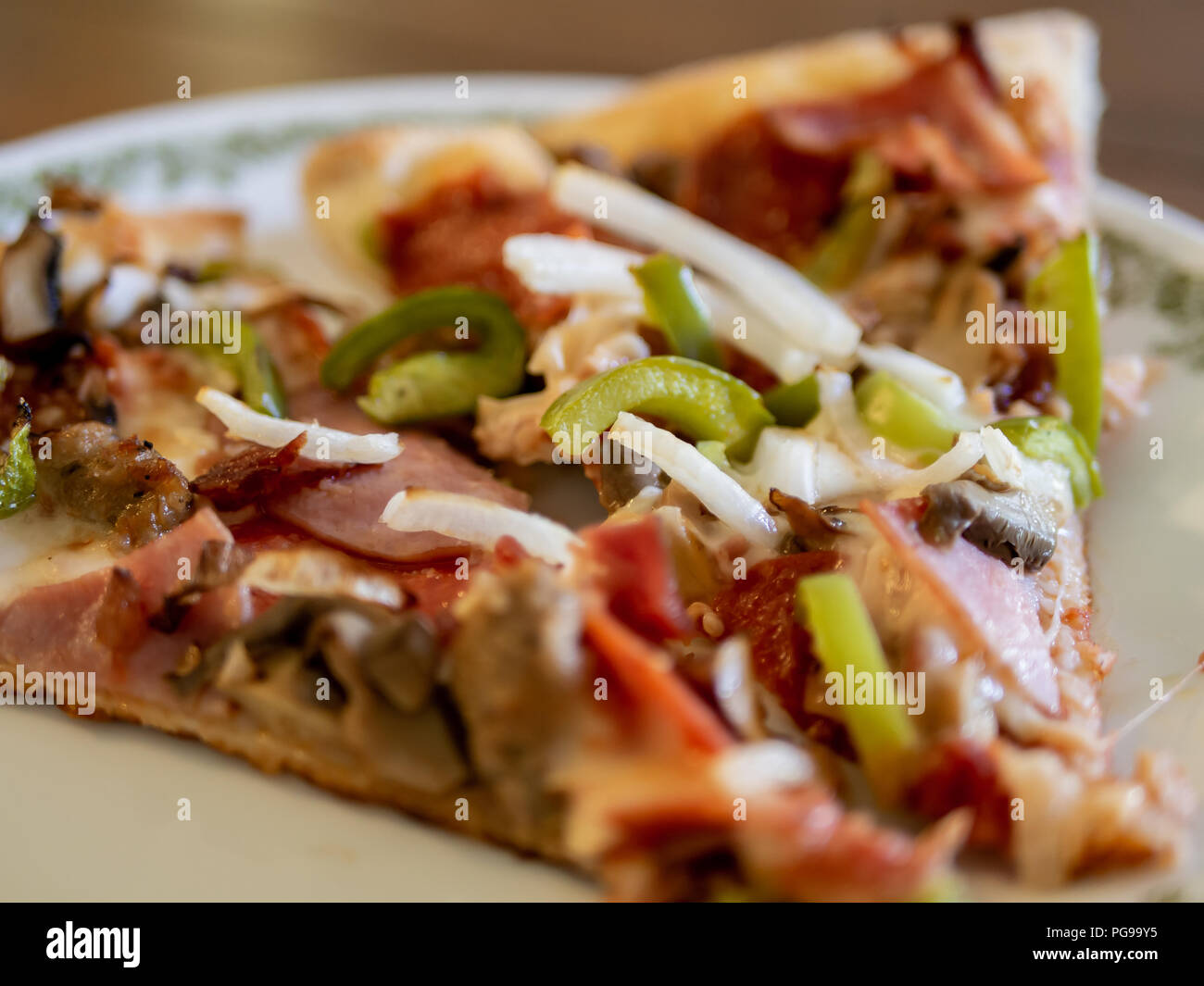 Wholesome pizza slices with a shallow depth of field Stock Photo - Alamy