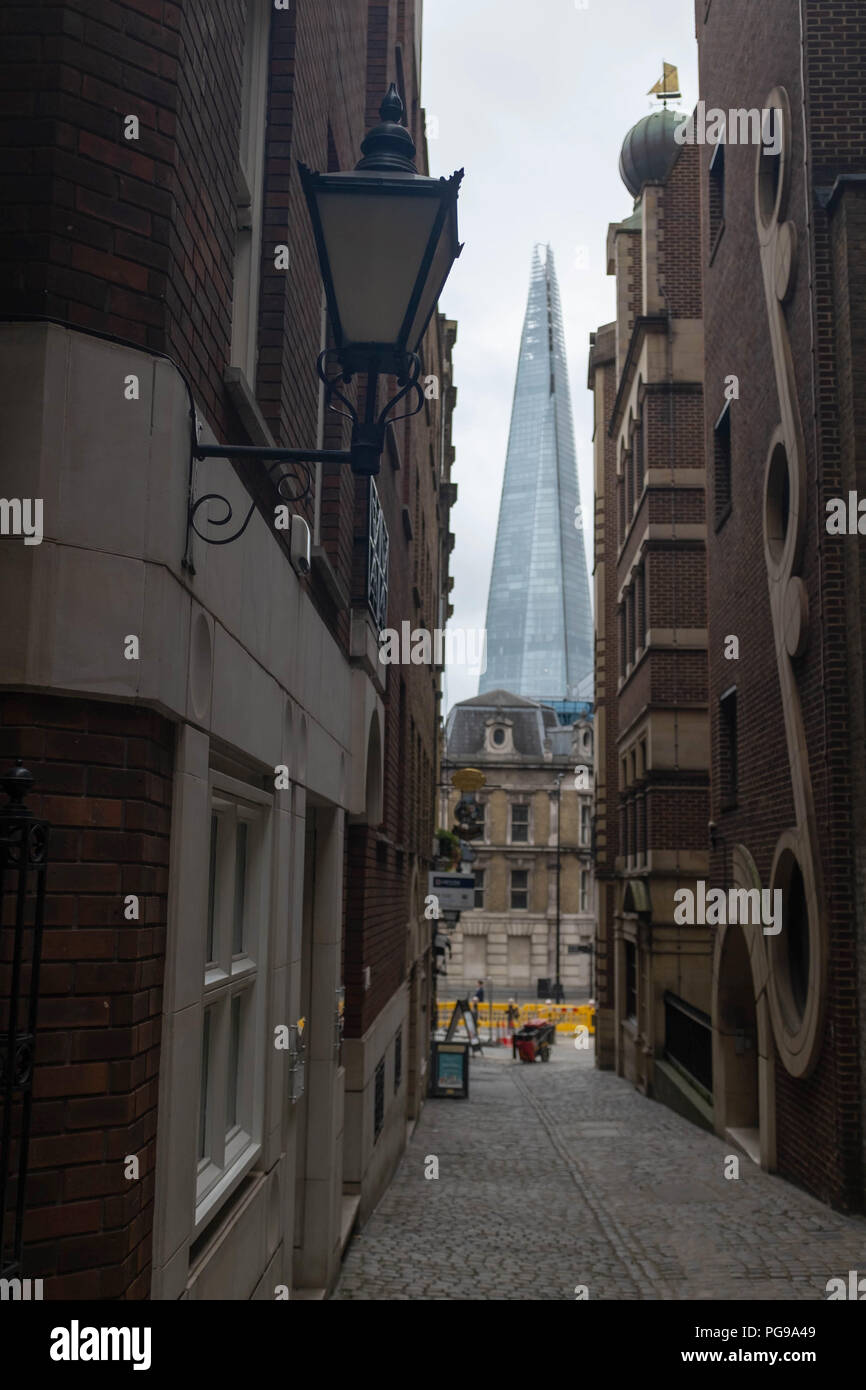 The Shard, pictured between old buildings in central London, UK Stock ...