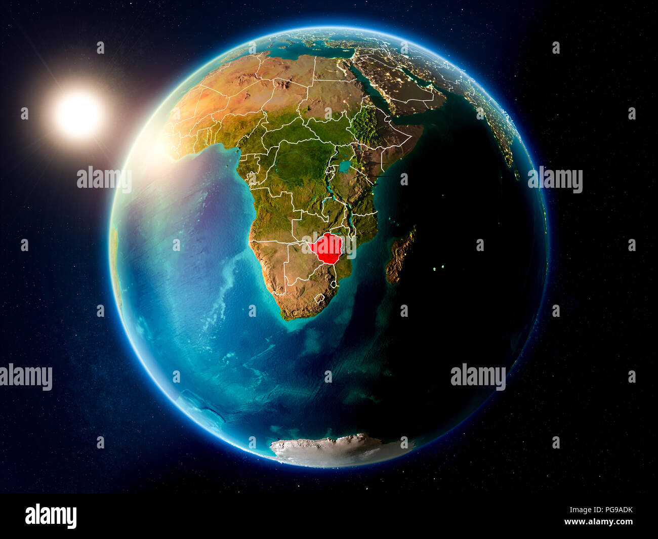 Sunset above Zimbabwe highlighted in red on planet Earth with visible ...