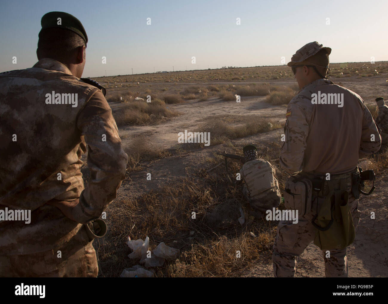 A Spanish soldier trains members of the Iraqi boarder guard forces on ...