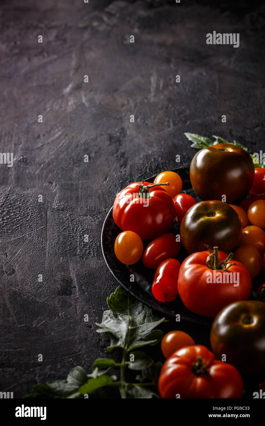 Red black cherry tomatoes hi-res stock photography and images - Alamy