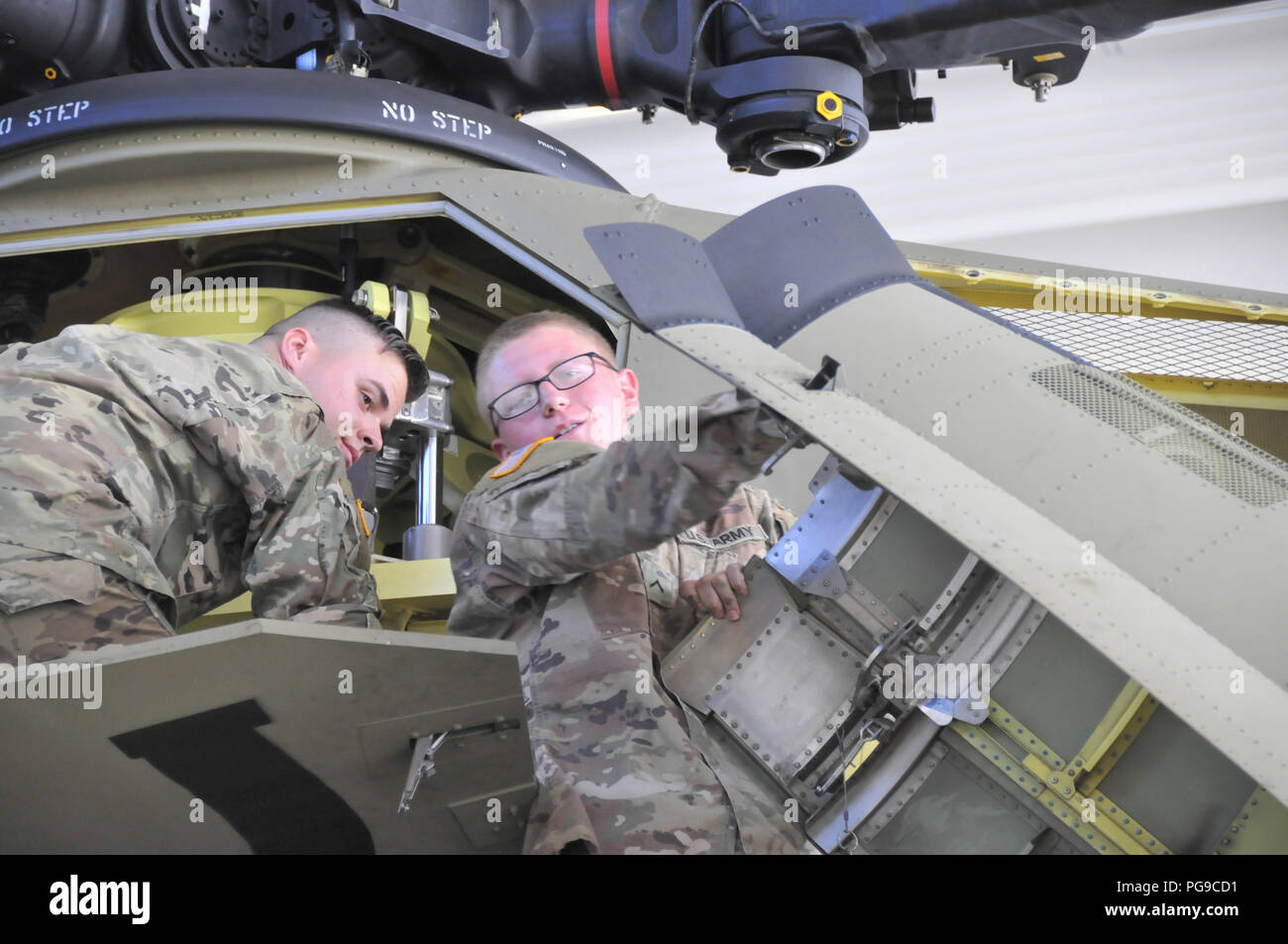 (From left to right) Pfc. Cody Sims and Pvt. Jacob Mcclellan with D ...