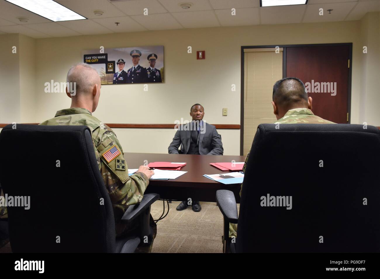 Nathaniel Hamilton sits at attention, while being questioned during an ...
