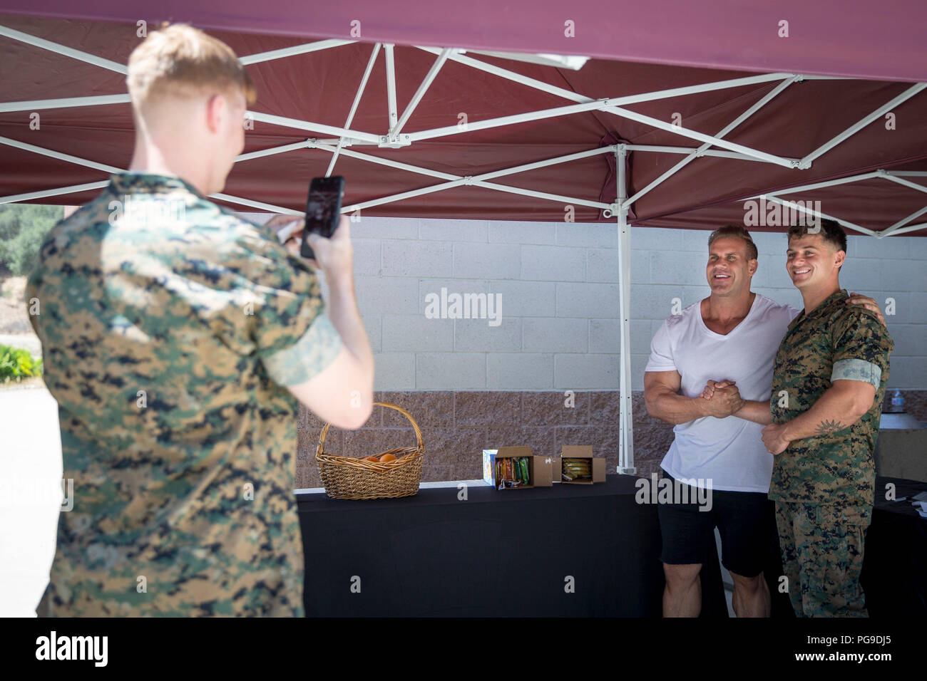 U.S. Marine Corps Cpl. Enoch Bukovac, right, combat marksmanship ...