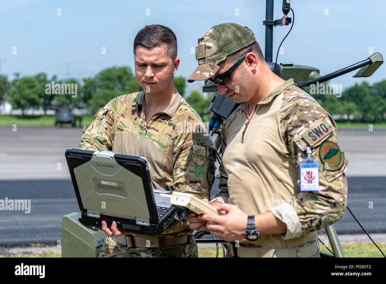 U.S. Air Force Staff Sgt. Tayler Williams and Staff Sgt. Joseph Witschy ...