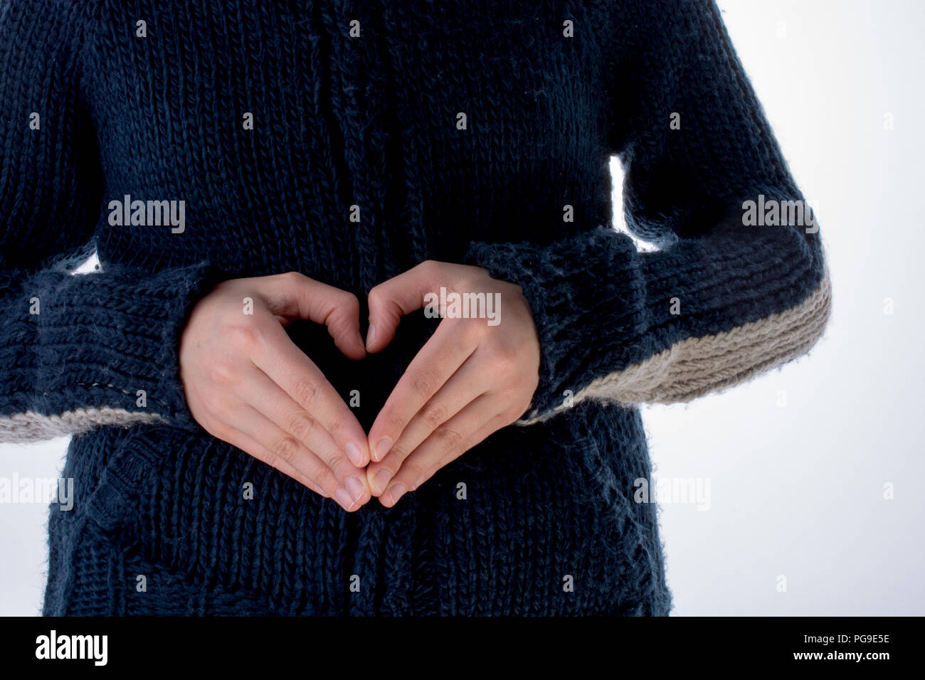 Hand making a heart on a white background Stock Photo - Alamy