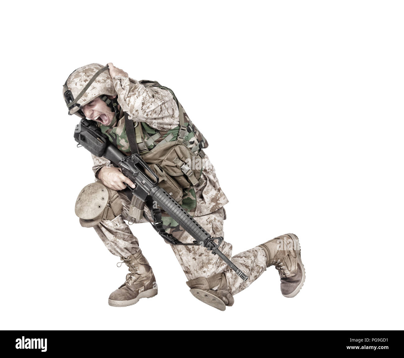 Soldier crouching after fire in the hole warning Stock Photo - Alamy