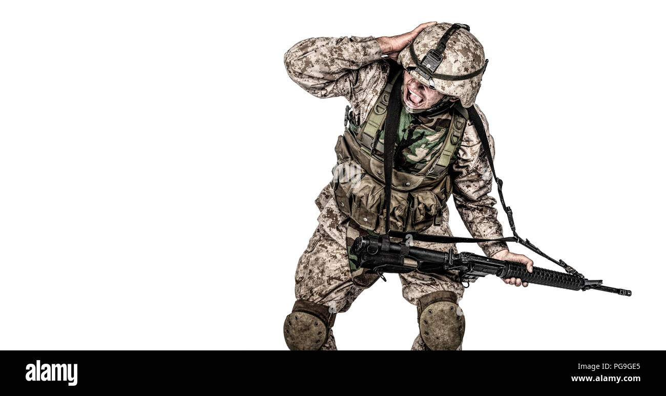 Soldier crouching after fire in the hole warning Stock Photo - Alamy