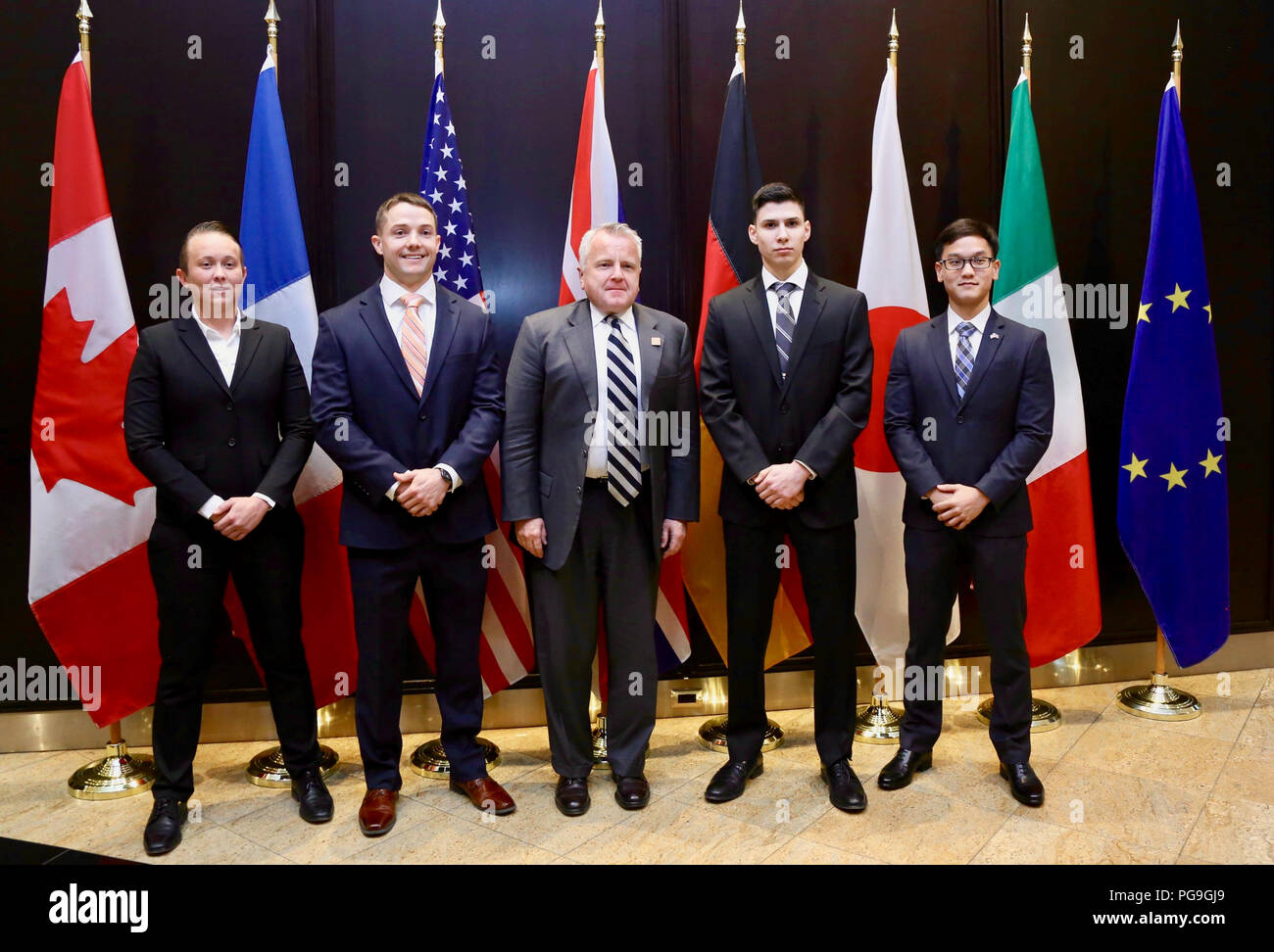 Acting Secretary of State John Sullivan poses for a photo with Marine ...