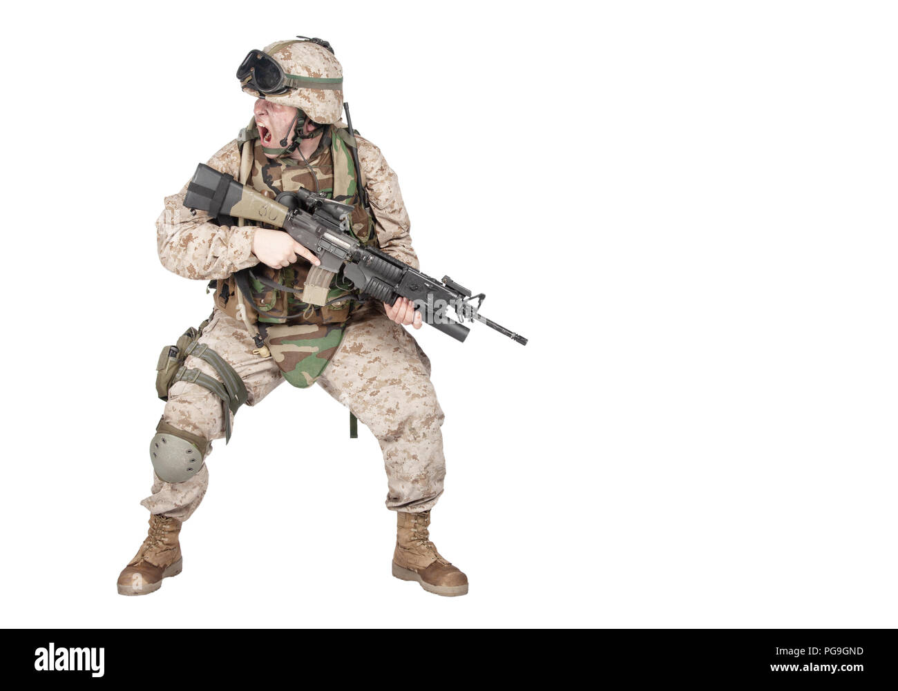 Soldier crouching Cut Out Stock Images & Pictures - Alamy