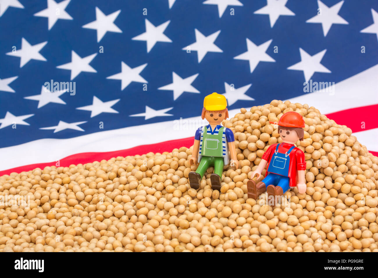 American flag with piled soybeans. Metaphor US-China trade war, China ...