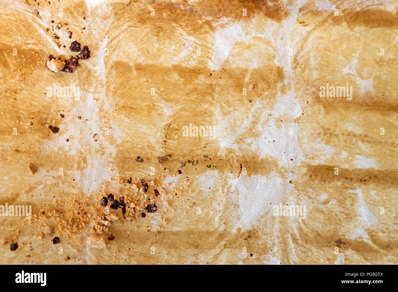 Background of used wax paper baking sheet with baking marks Stock Photo ...