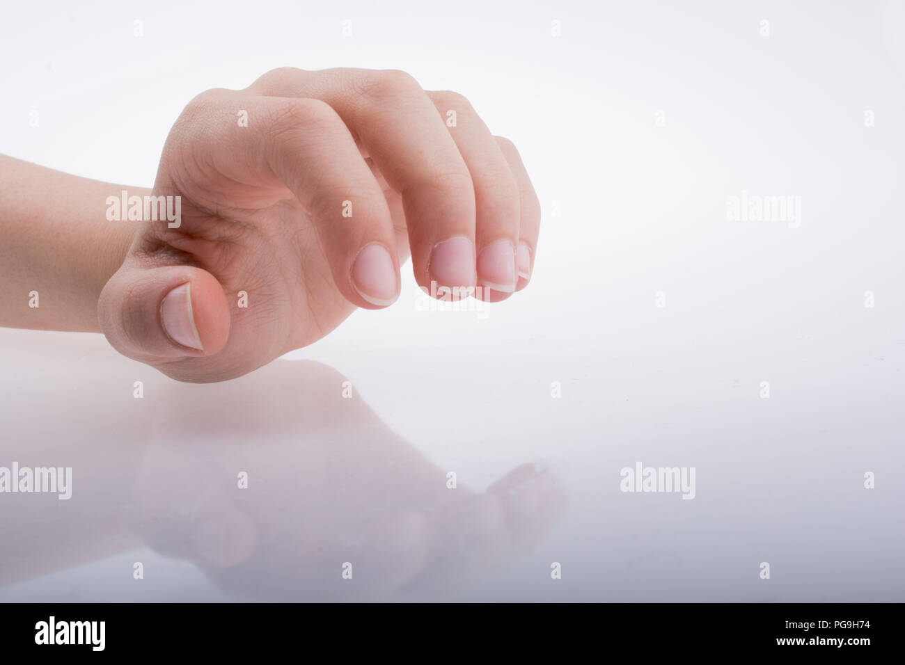 Hand holding on a white background Stock Photo - Alamy