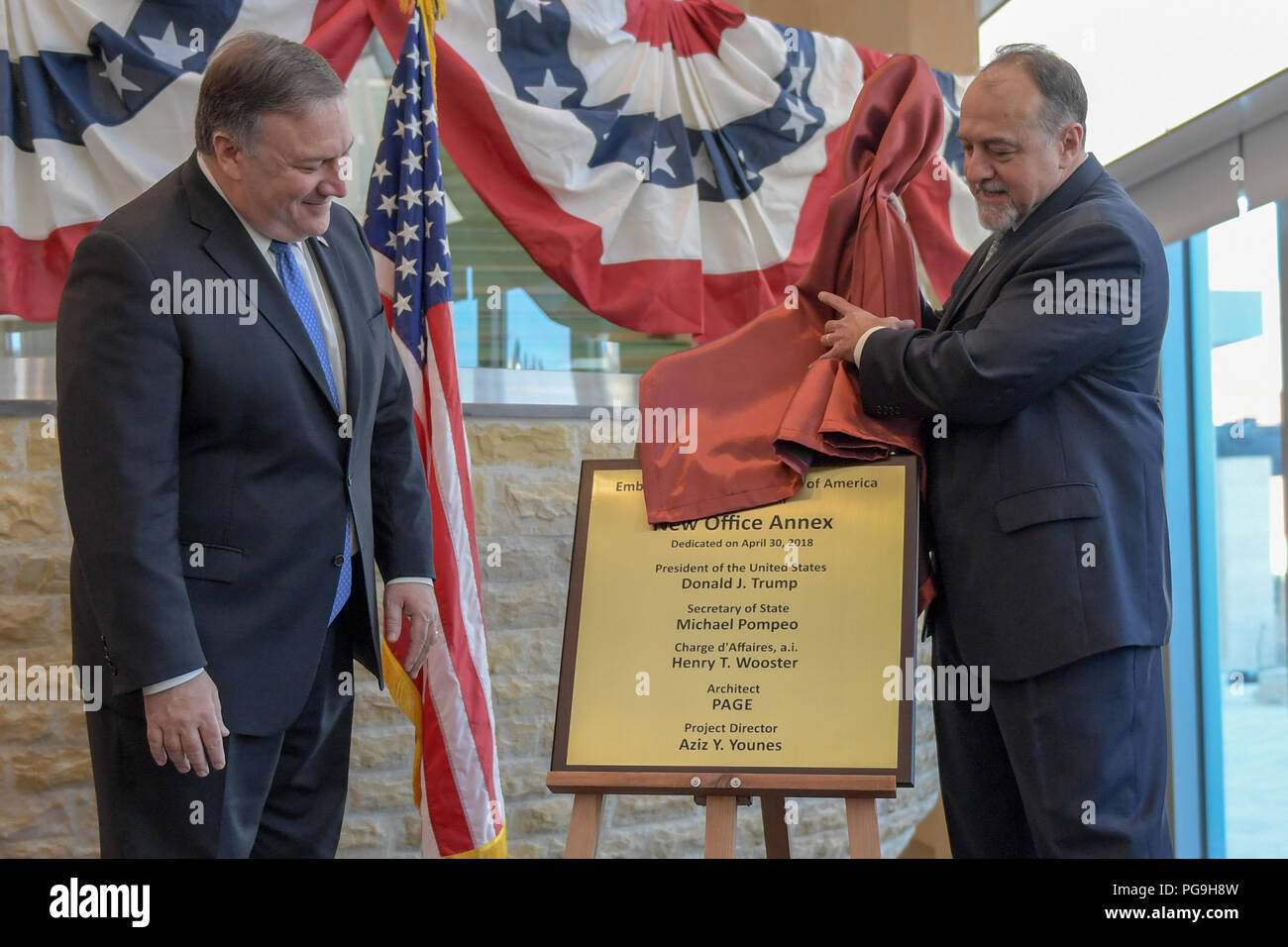 U.S. Secretary of State Mike Pompeo, flanked by U.S. Embassy Jordan ...