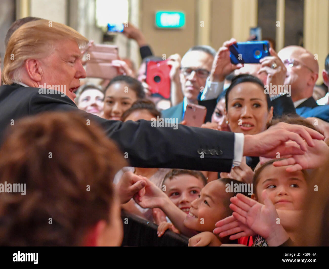 President Donald J. Trump flanked by U.S. Secretary of State Mike ...