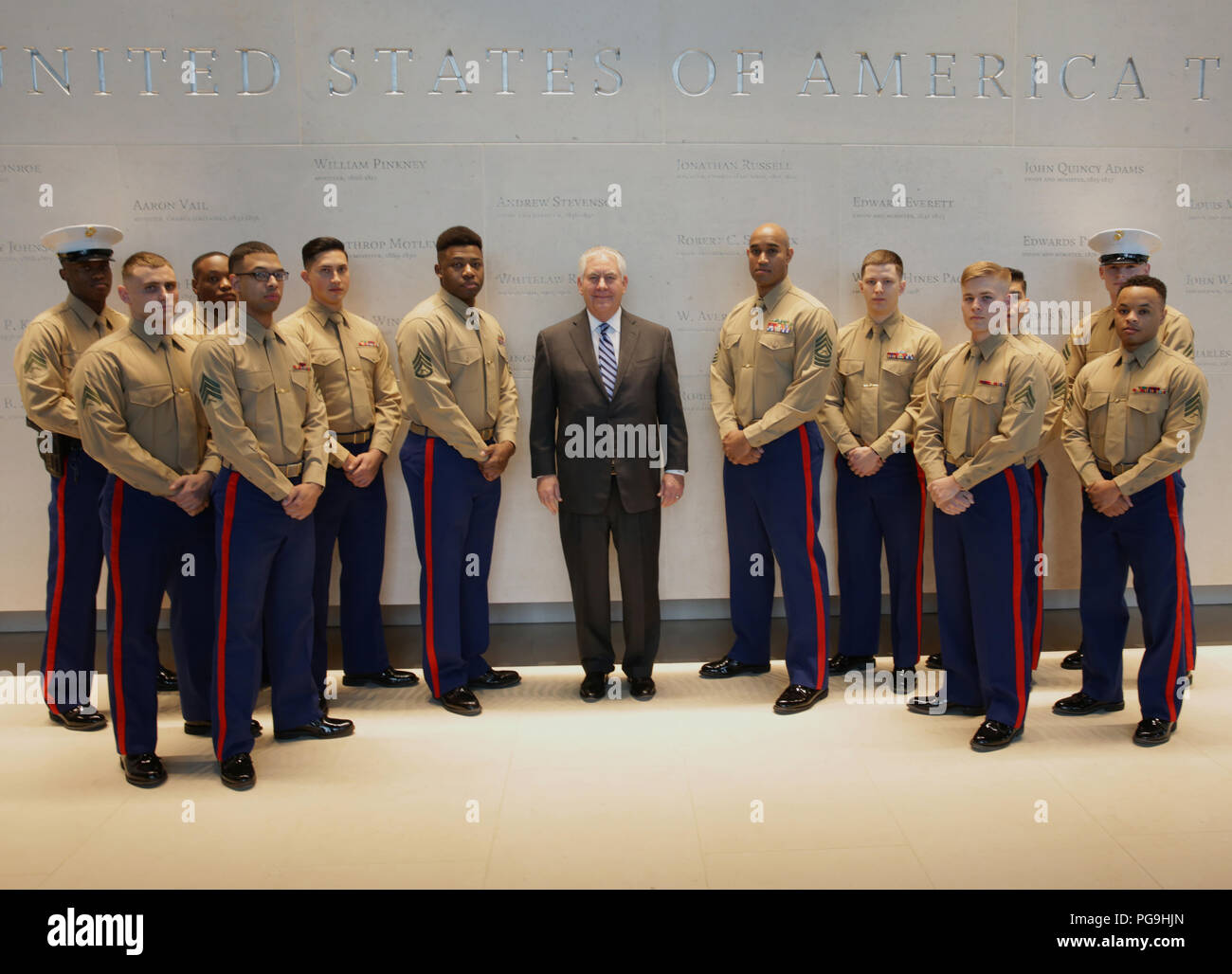 U.S. Secretary of State Rex Tillerson poses for a photo with Marine Security Guards, after ...