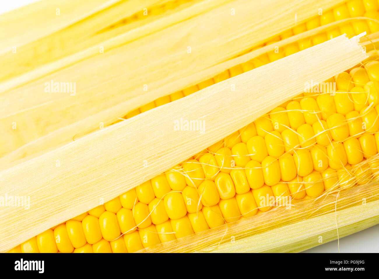 food background of a texture of corn cobs closeup Stock Photo - Alamy