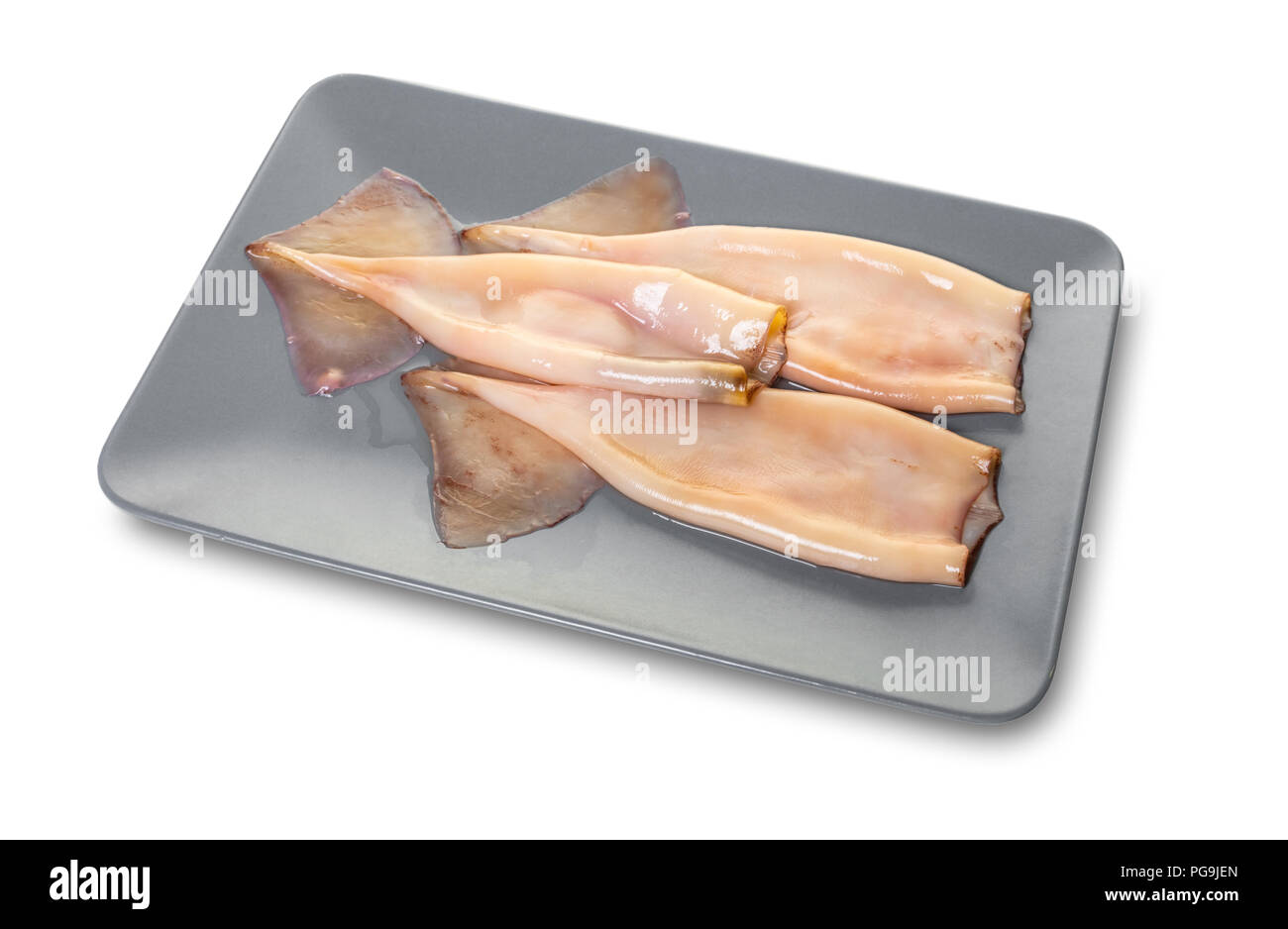 prepared squid in a plate on a white isolated background Stock Photo ...
