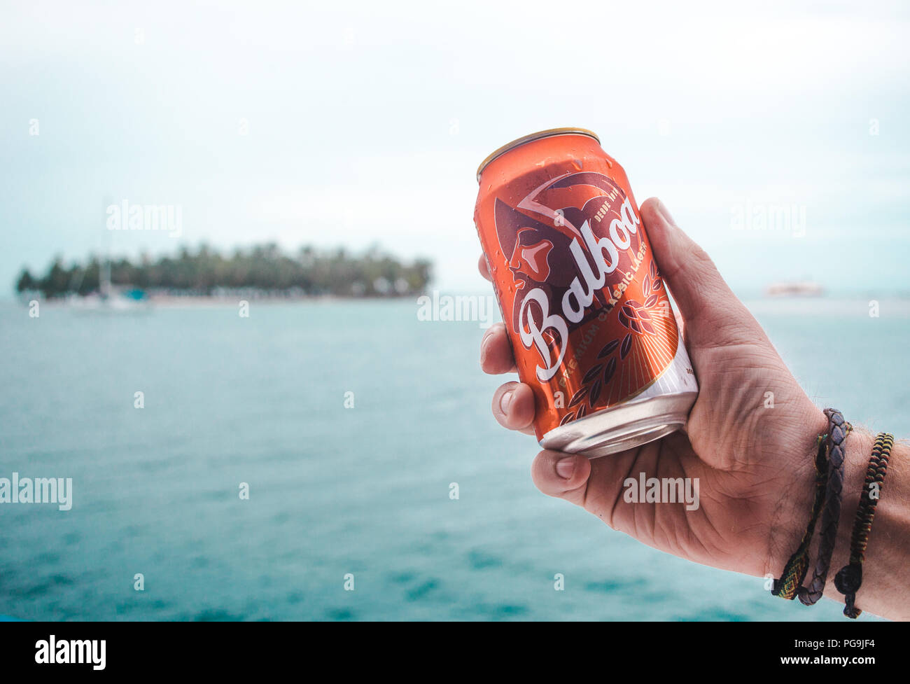 Can of Balboa, local beer brand of Panama, being held by millennial ...