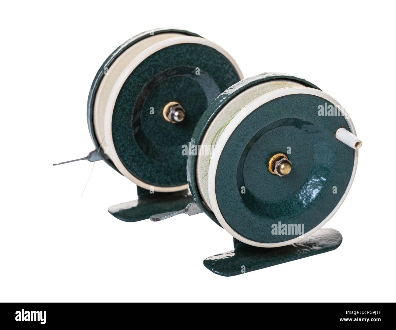 coil for fishing rod close-up on white isolated background Stock Photo ...