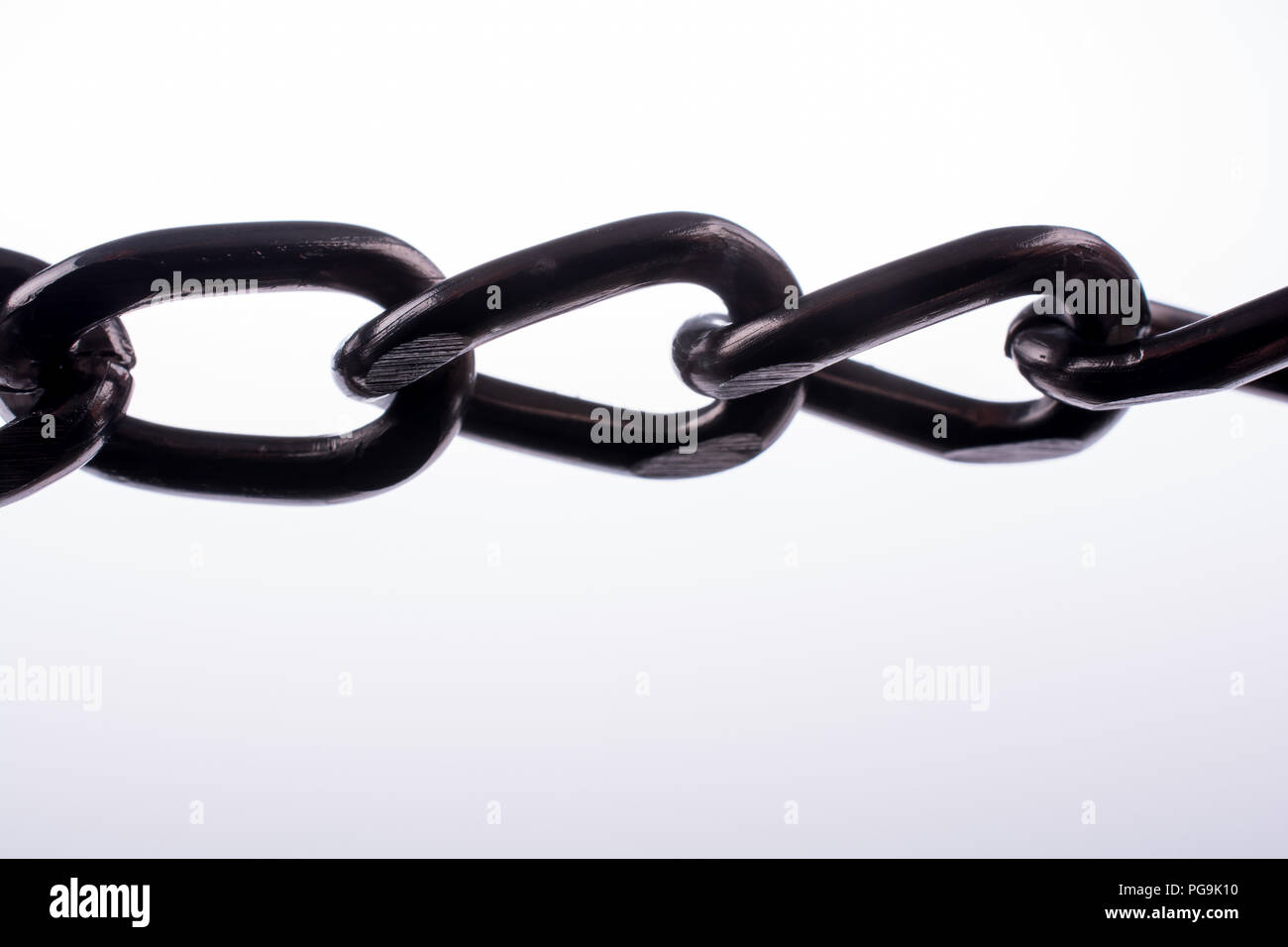 metal chain on white background Stock Photo - Alamy
