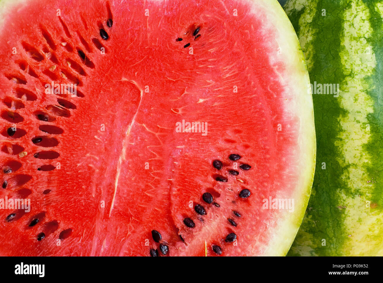 red juicy watermelon as a background Stock Photo - Alamy