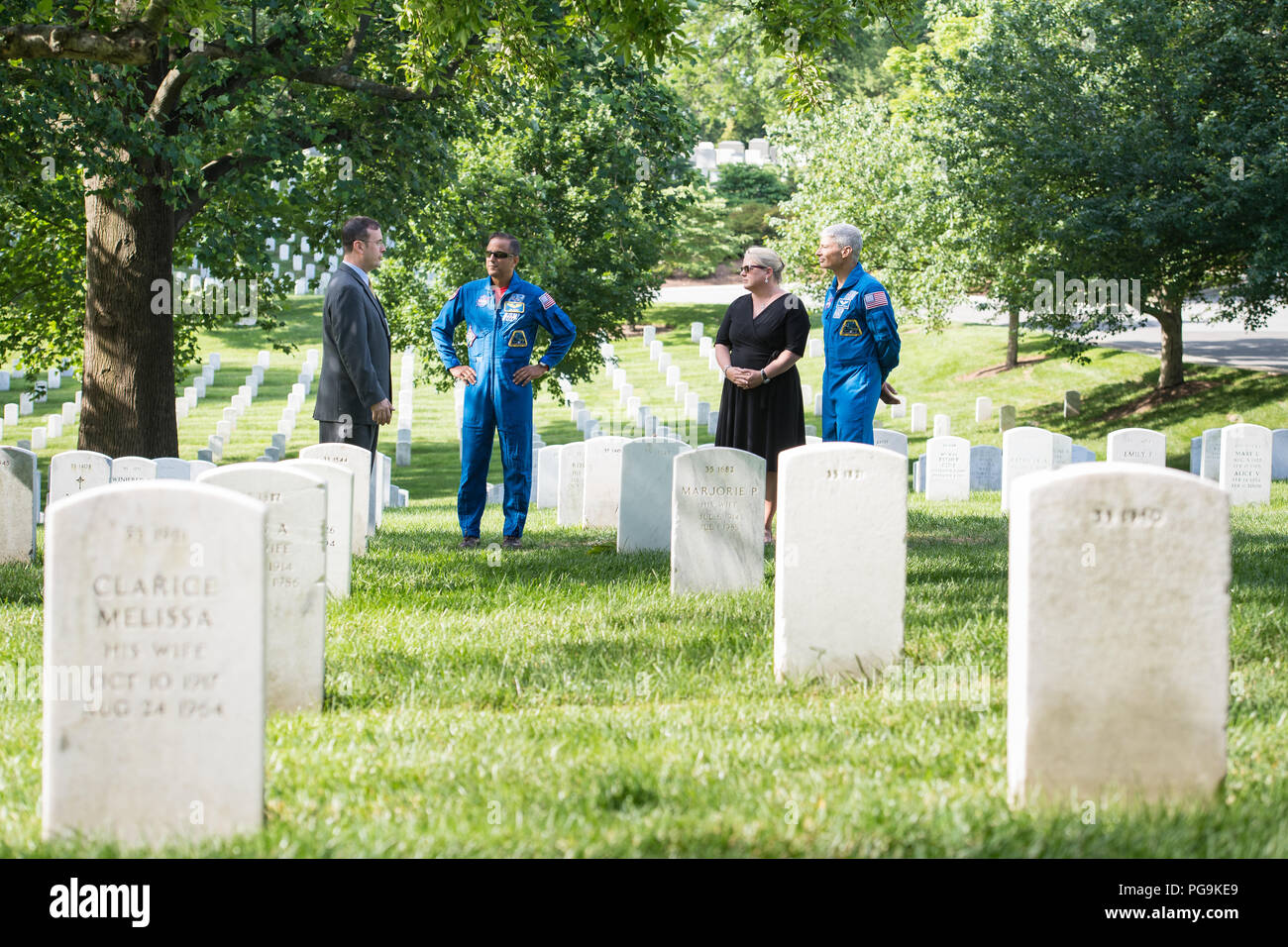 NASA astronauts Joe Acaba, second from left, and Mark Vande Hei, right ...