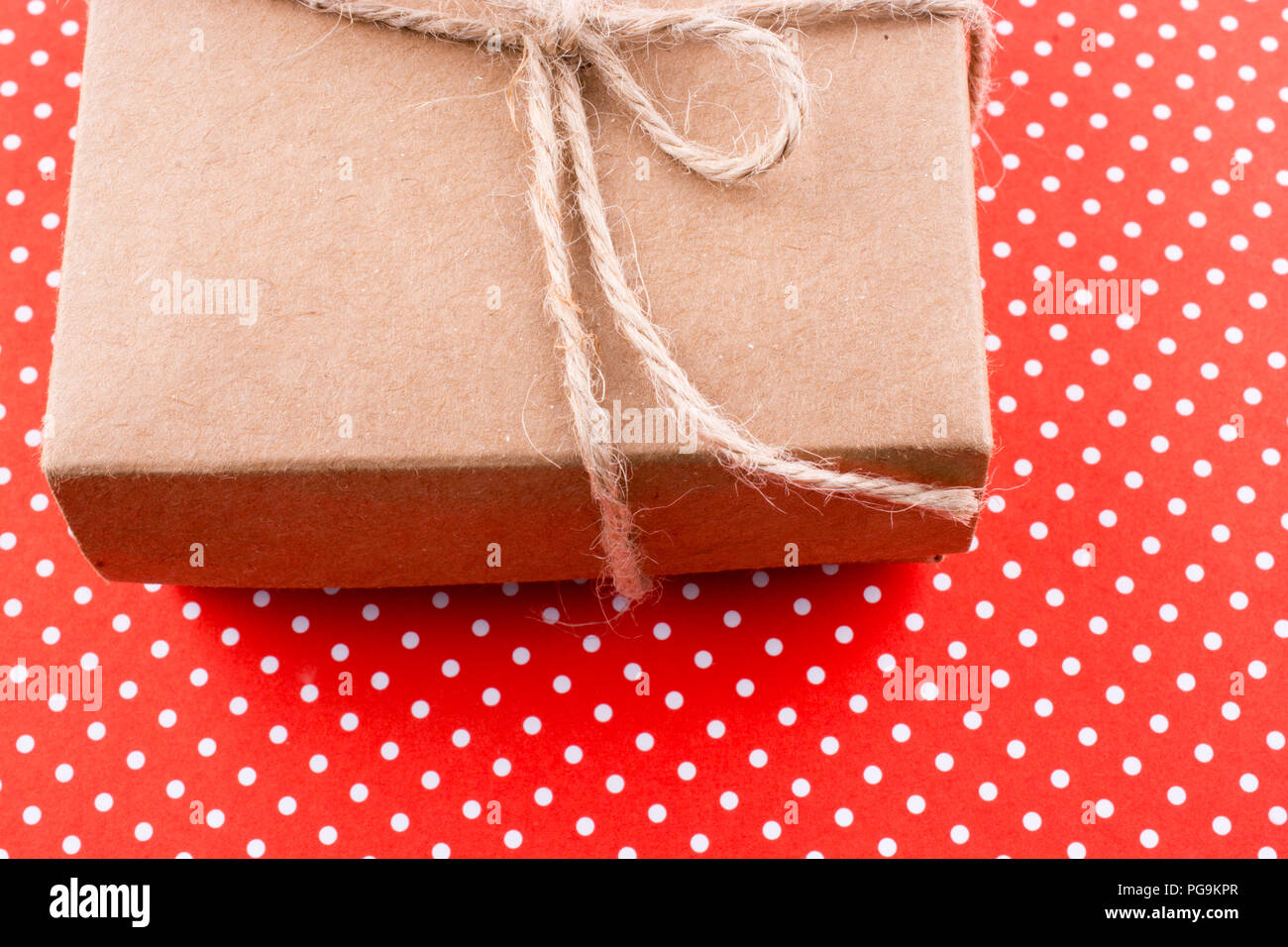 Carton box on a red background Stock Photo - Alamy