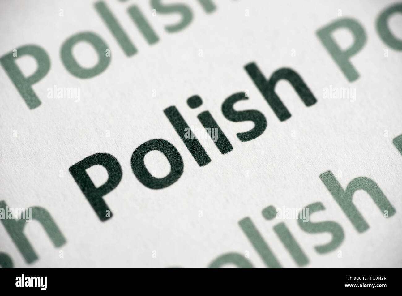 word Polish language printed on white paper macro Stock Photo - Alamy
