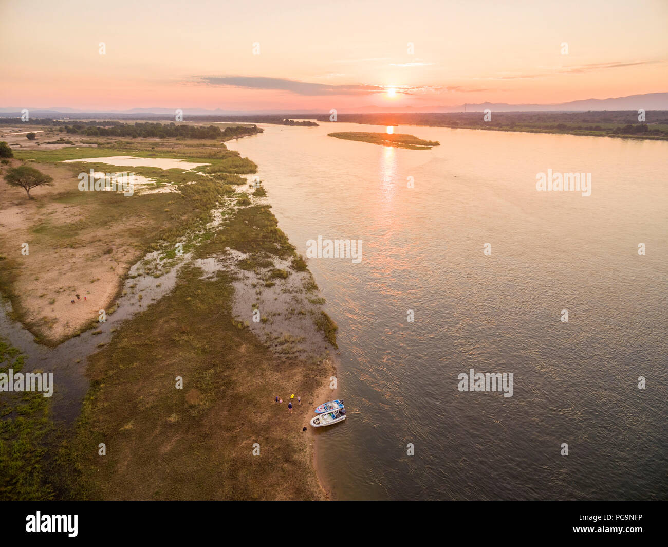 A fishing boat seen on the Zambezi river, Zimbabwe Stock Photo - Alamy