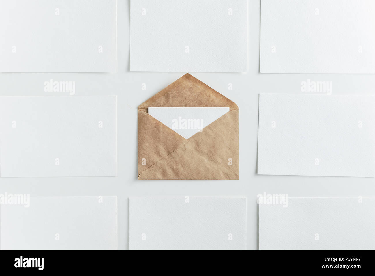 Kraft brown paper envelope and blank white cards template mock up Stock ...