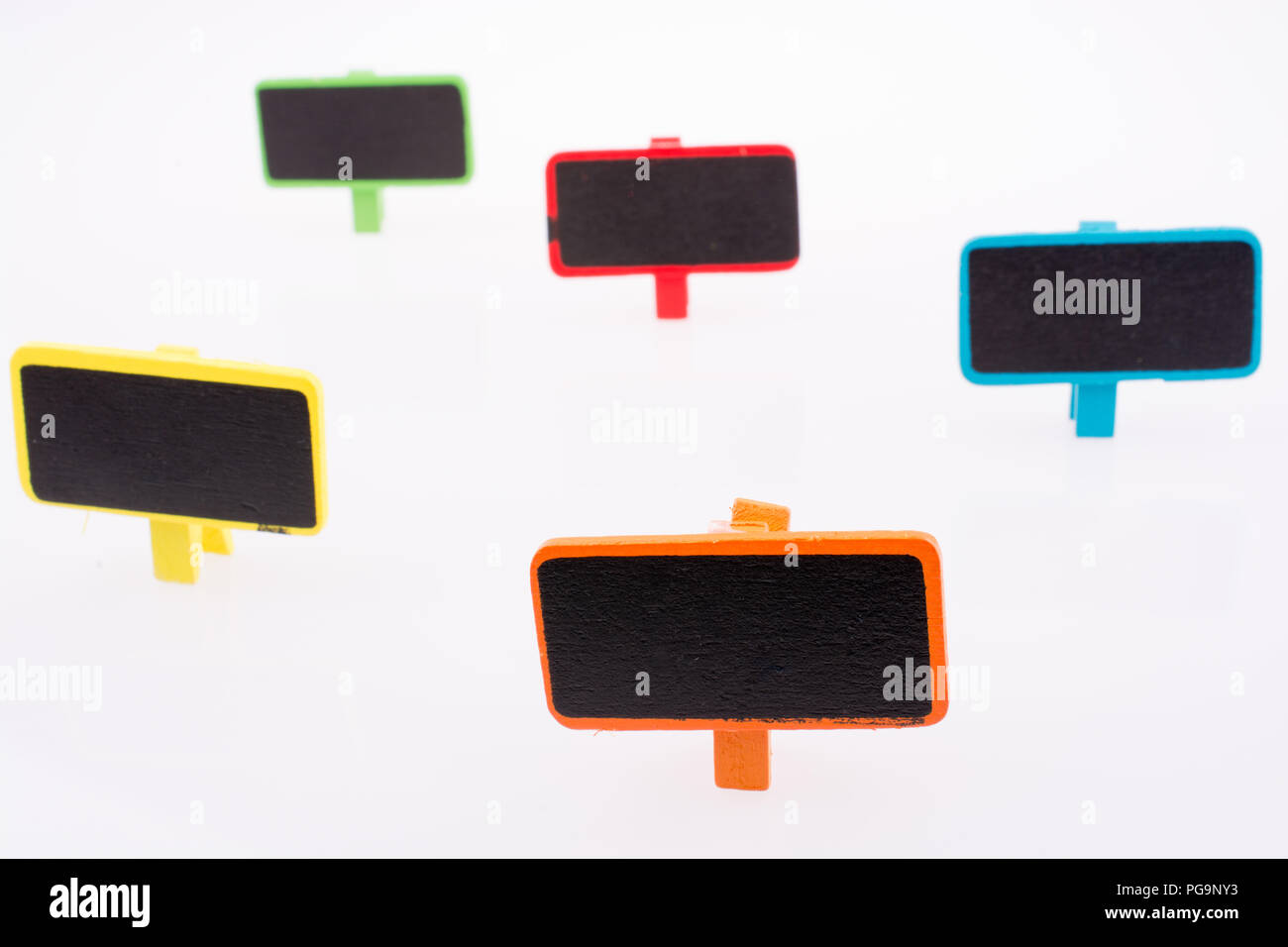 Colorful little signboards on a white background Stock Photo - Alamy