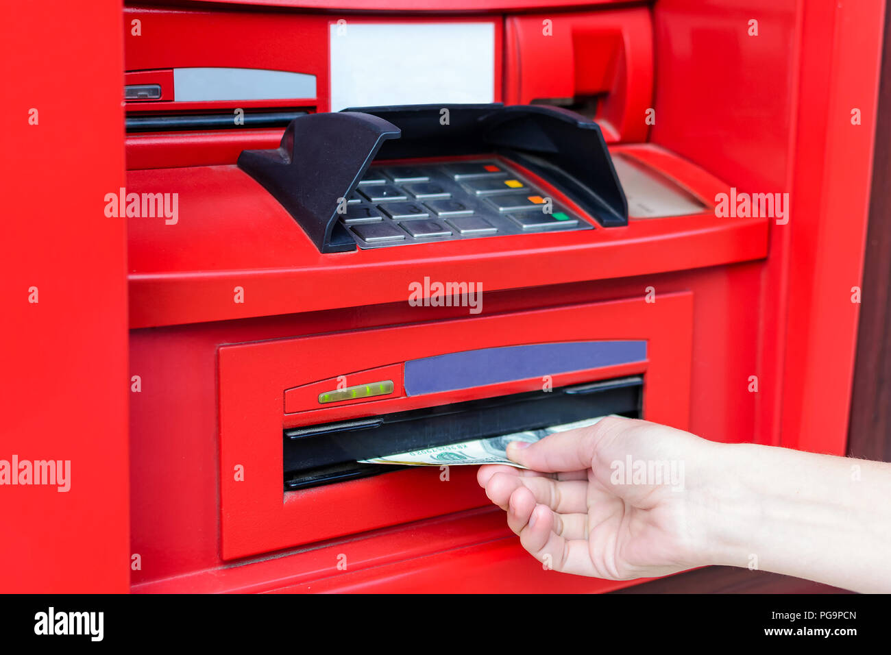 Red atm hi-res stock photography and images - Alamy