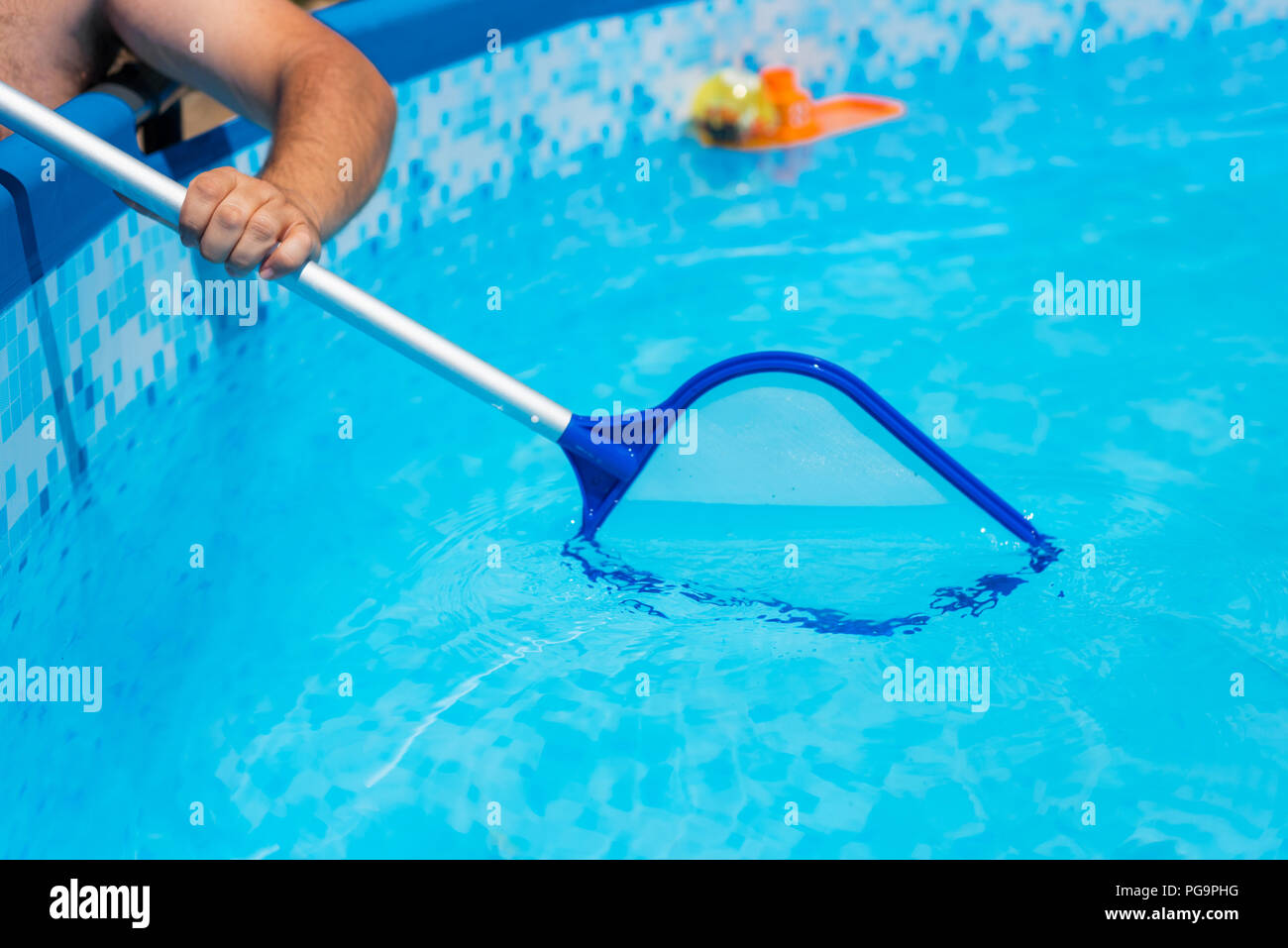 Pool surface cleaning hi-res stock photography and images - Alamy