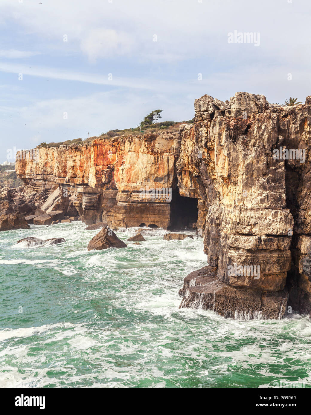 Grotto Boca do Inferno in Cascais, Portugal. Dangerous cave with strong ...