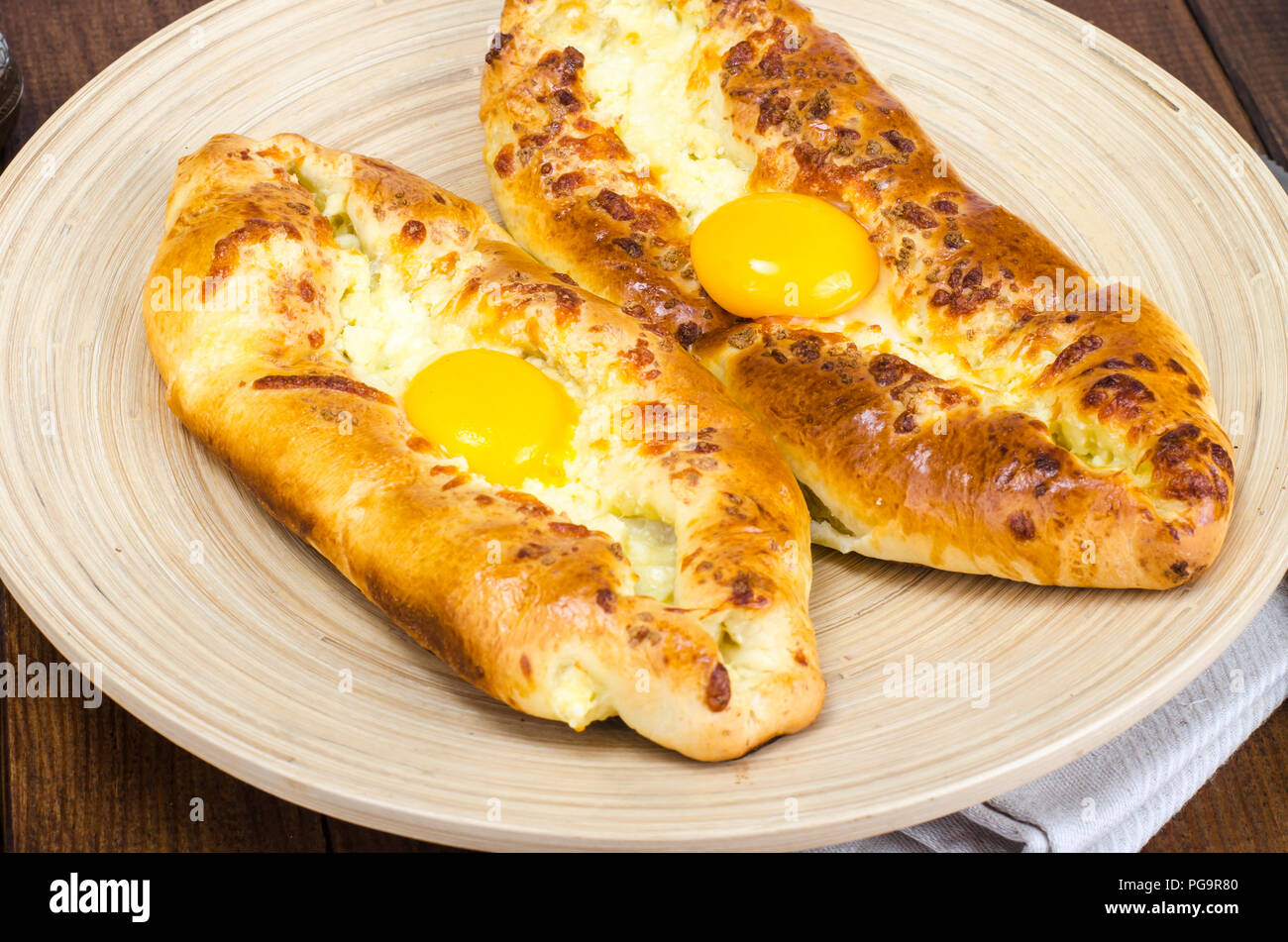 Adjarian khachapuri. Georgian traditional national cheese bread with ...