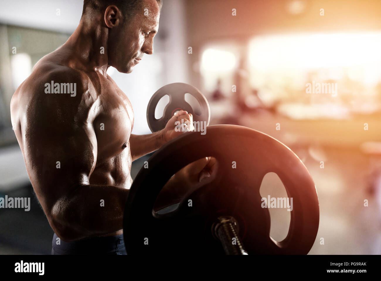 Strength training bodybuilder hi-res stock photography and images - Alamy