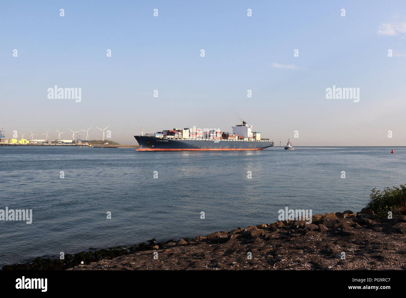 The container ship E.R. Santa Barbara arrives at the port of Rotterdam ...