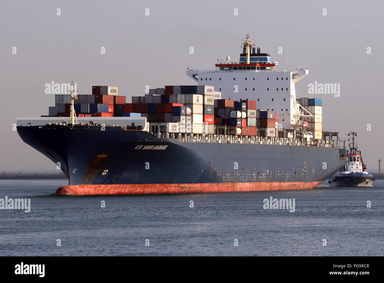 The container ship E.R. Santa Barbara arrives at the port of Rotterdam ...