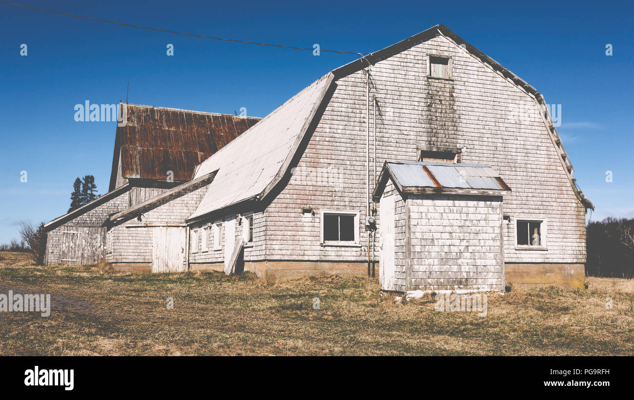 Old and weathered barn. Stylish faded look Stock Photo - Alamy