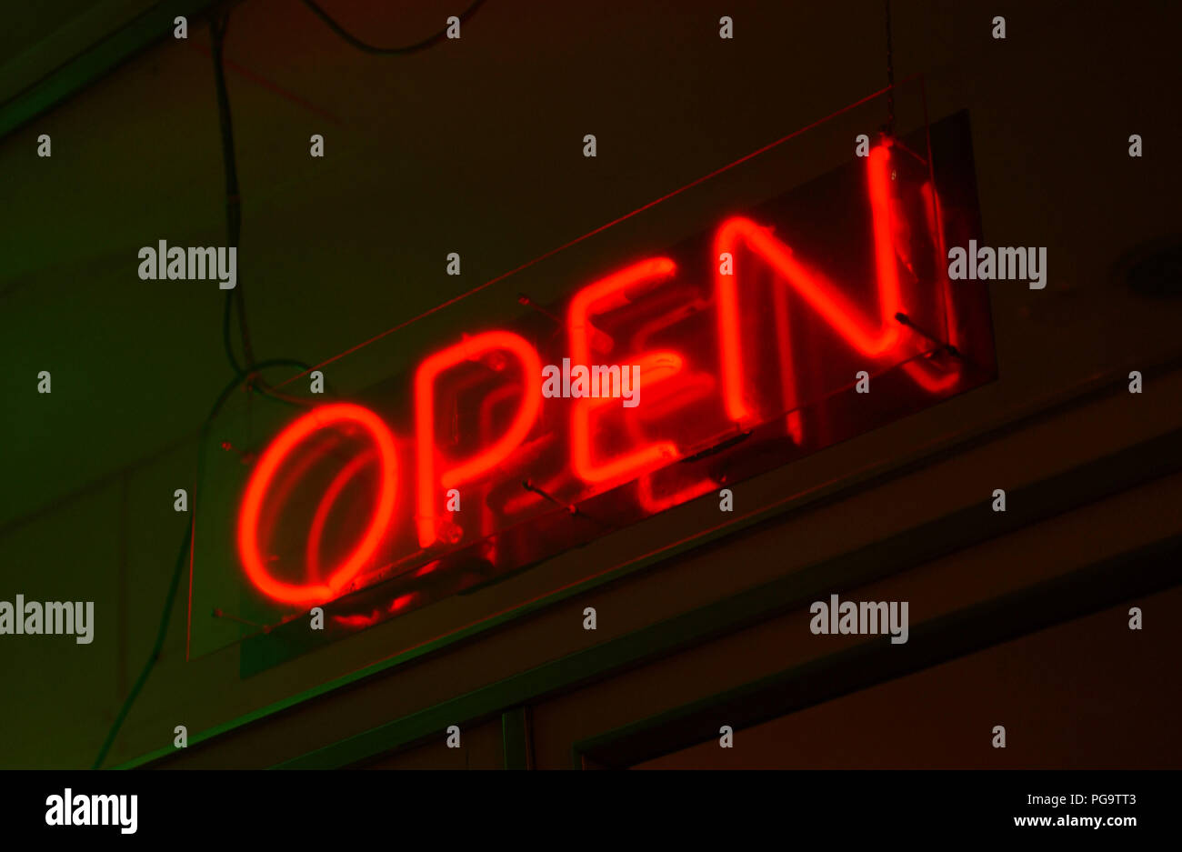 A shining neon sign Open in the night Stock Photo - Alamy