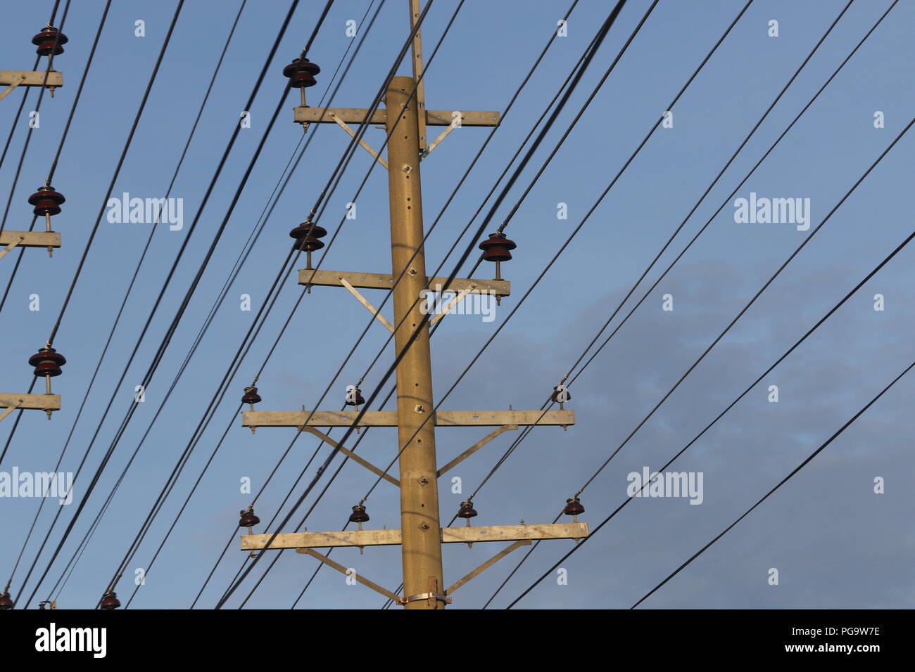 Electrical power lines hang from transmission pylons in Dhaka Stock ...