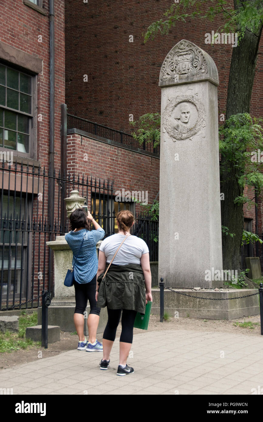 Tourists view John Hancock's grave in the Granary Burying Ground ...