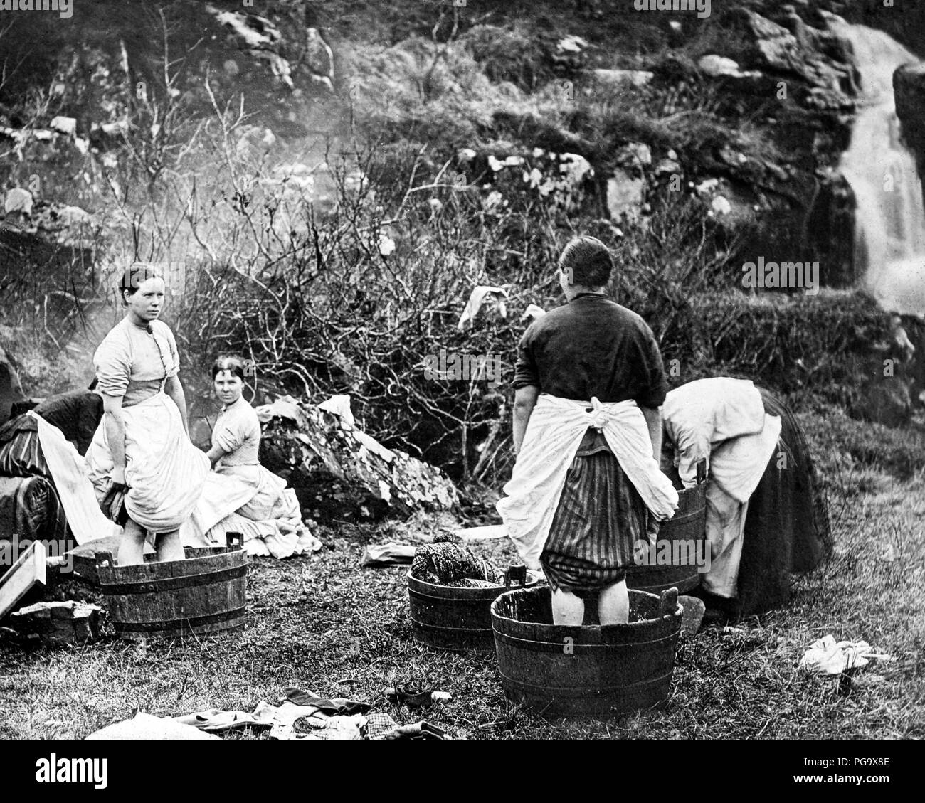Washing clothes on old vintage hi-res stock photography and images - Alamy