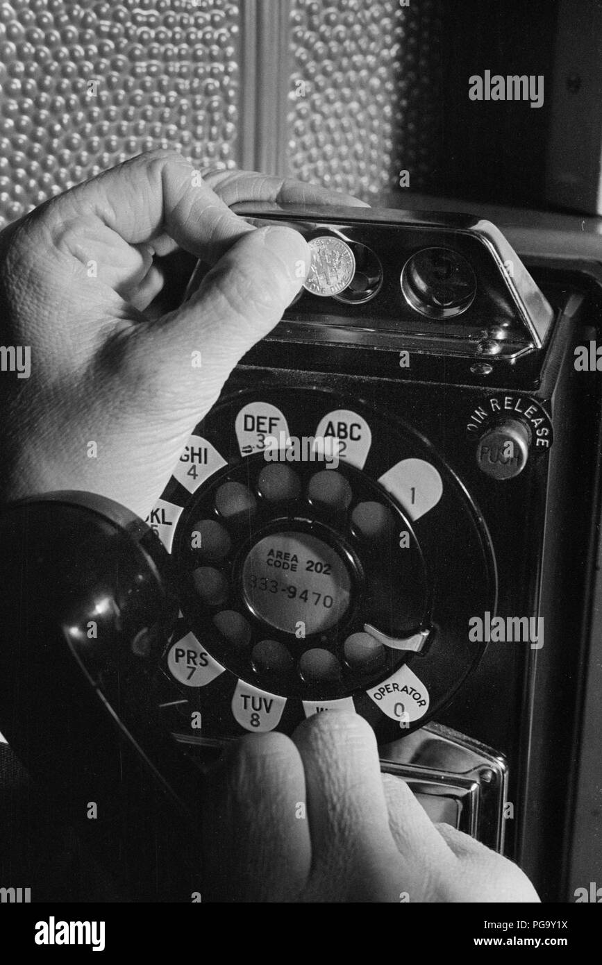 Coin operated public telephone - pay phone Stock Photo - Alamy